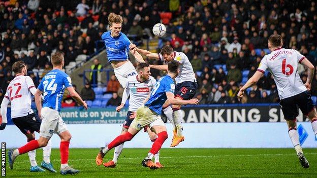 Sean Raggett: Portsmouth defender signs new two-year contract - BBC Sport