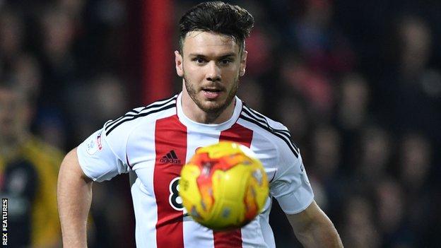 Scott Hogan: Brentford boss Dean Smith warns striker's suitors over ...