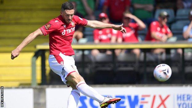 Wrexham 3-1 Gateshead: Dragons climb to second after seeing off 10-man ...