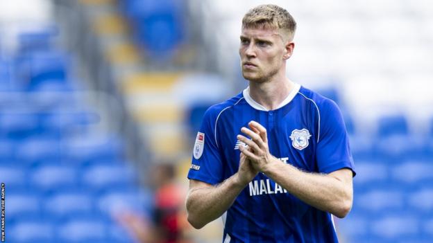 Mark McGuinness: Cardiff City defender signs new four-year deal - BBC Sport