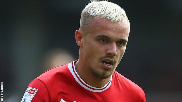 Luke Thomas: Barnsley forward out for four months with double leg ...