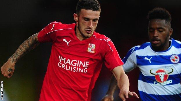 Brad Barry: Chesterfield sign Swindon defender on two-year deal - BBC Sport