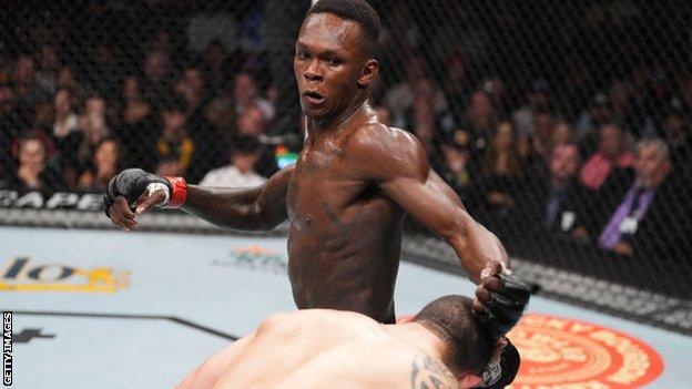 UFC 271: Israel Adesanya untouchable at middleweight; the Rock praises ...