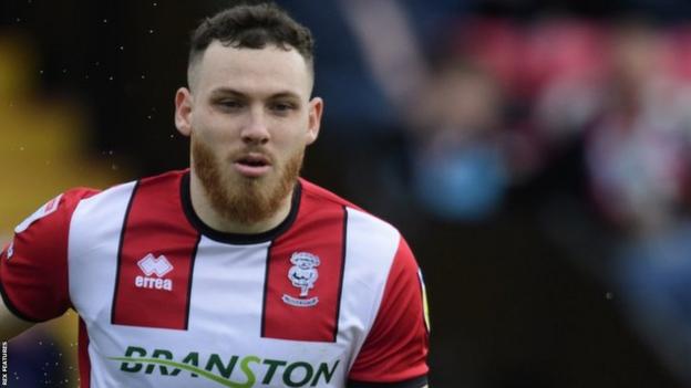 Ben House: Striker signs new deal with Lincoln City until 2025 - BBC Sport