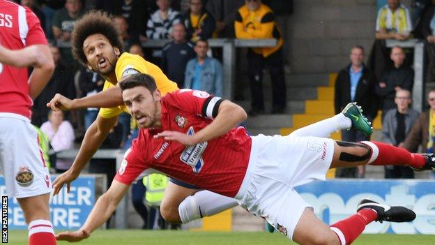 Shaun Pearson: Wrexham captain hopes coaching team will remain - BBC Sport