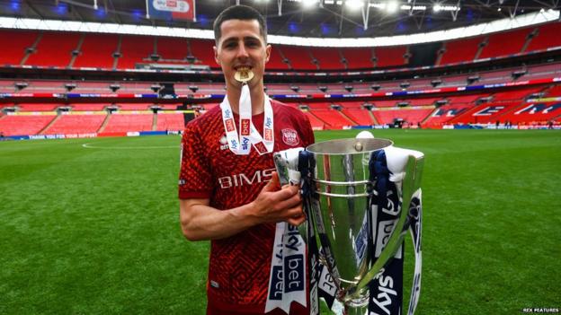 Jon Mellish: Carlisle United midfielder signs new deal until 2026 - BBC ...