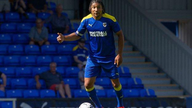 Darius Charles: AFC Wimbledon defender announces retirement - BBC Sport