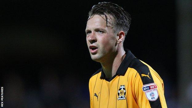 Josh Coulson: Cambridge United defender signs new contract - BBC Sport