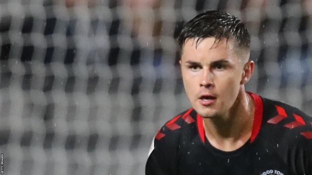 Callum Johnson: Mansfield Town sign Ross County defender on 18-month ...