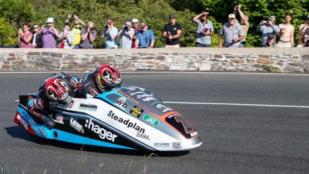 Isle of Man TT: Birchall brothers break 120mph sidecar barrier - BBC Sport