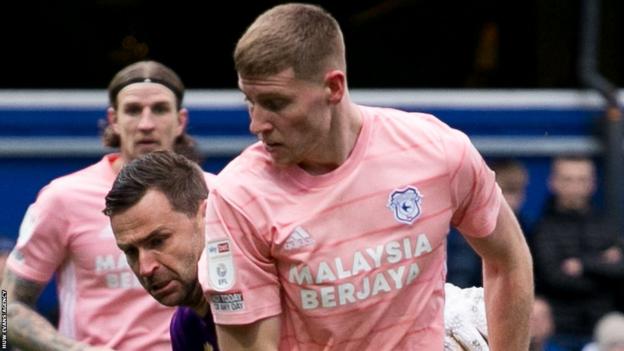 Cardiff City recall defender Mark McGuinness from Owls loan - BBC Sport