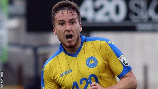 Luke Young: Torquay United midfielder to miss most of season with knee ...