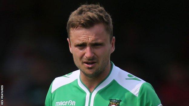 Paul Rutherford: Midfielder signs new Wrexham contract - BBC Sport