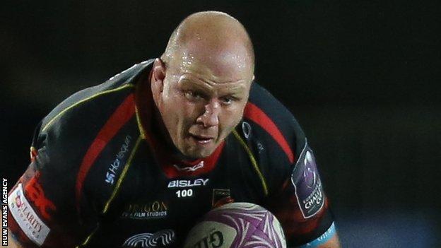 Brok Harris: Prop re-signs for Dragons - BBC Sport