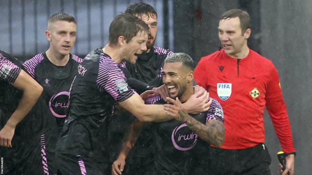 Linfield investigating alleged racism from crowd towards Loughgall's ...