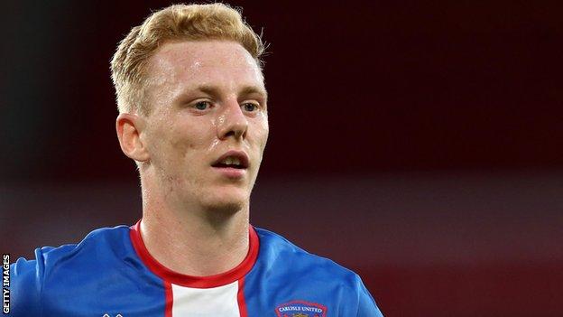 Callum Guy: Carlisle United captain signs new two-year contract - BBC Sport