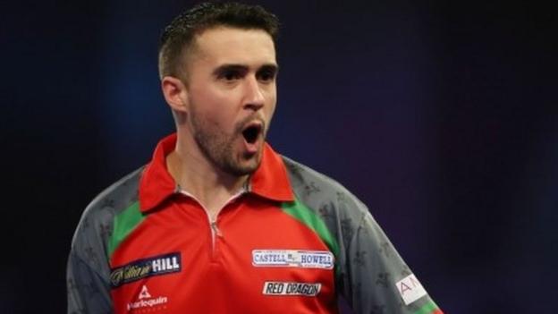 PDC World Darts Championship: Daryl Gurney beaten by Jamie Lewis - BBC ...