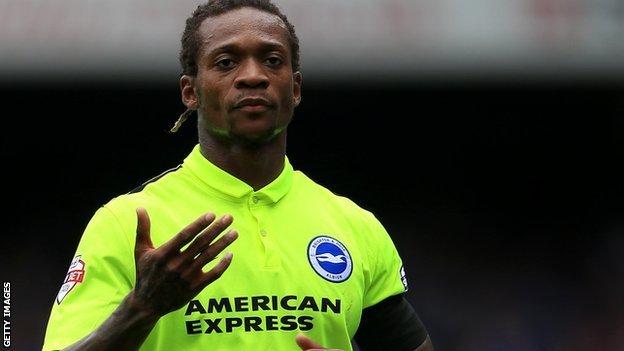 Gaetan Bong: Brighton and Hove Albion defender agrees new deal - BBC Sport