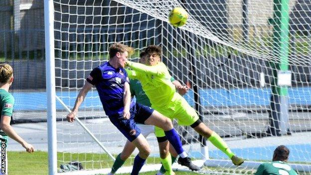 Lucas Hanley: Guernsey FC goalkeeper fine after head injury scare - BBC ...