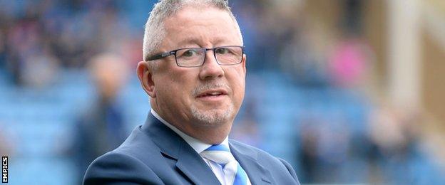 Paul Scally: Gillingham chairman backs boss Justin Edinburgh - BBC Sport