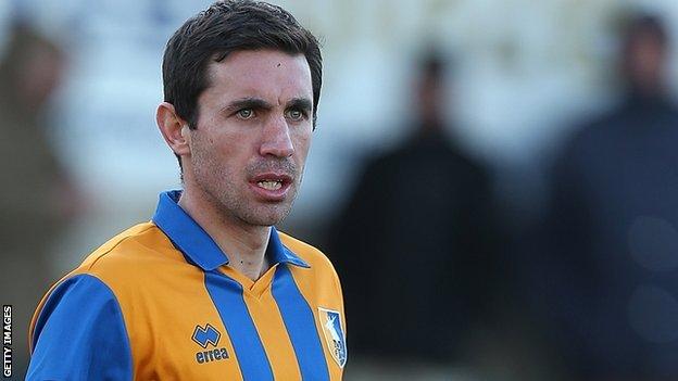 John Thompson: Scarred Mansfield defender forced to retire - BBC Sport