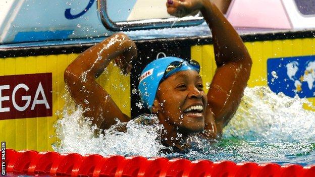 Doha Worlds: Alia Atkinson earns historic Jamaica gold - BBC Sport