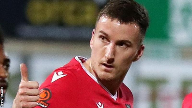 Luke Young: Midfielder pens new one-year Wrexham contract - BBC Sport