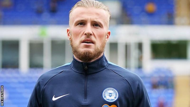 George Cooper: Plymouth Argyle sign Peterborough midfielder on loan ...