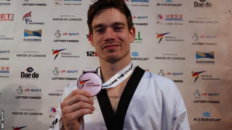 World Taekwondo Grand Prix: Ex-GB fighter Aaron Cook wins bronze for ...
