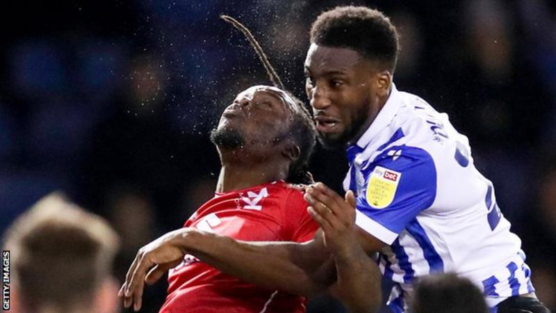 Chey Dunkley: Shrewsbury Town sign former Sheffield Wednesday centre ...
