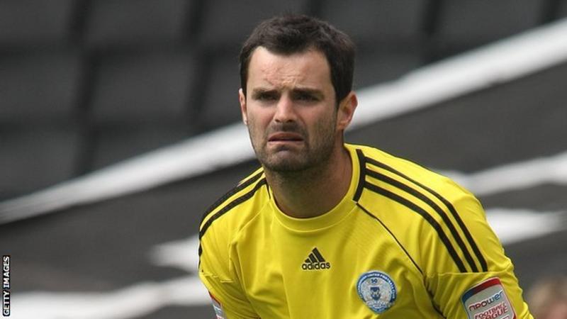 Peterborough goalkeeper Joe Lewis opts for Cardiff City - BBC Sport
