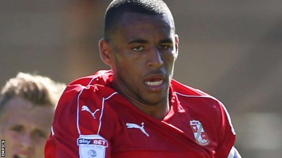 Nathan Thompson: Portsmouth sign Swindon Town defender - BBC Sport