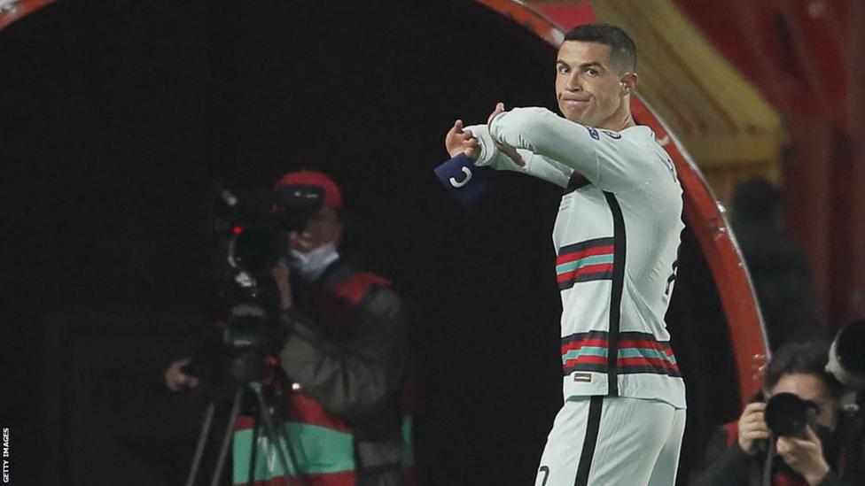Cristiano Ronaldo: Captain's armband thrown away in Serbia match sells ...