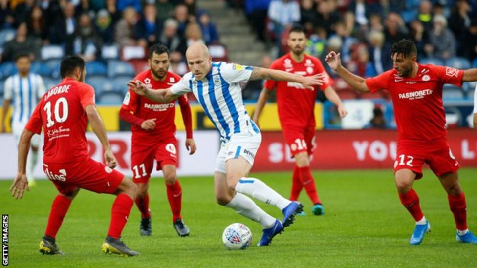 Aaron Mooy: Brighton sign Huddersfield midfielder on season-long loan ...