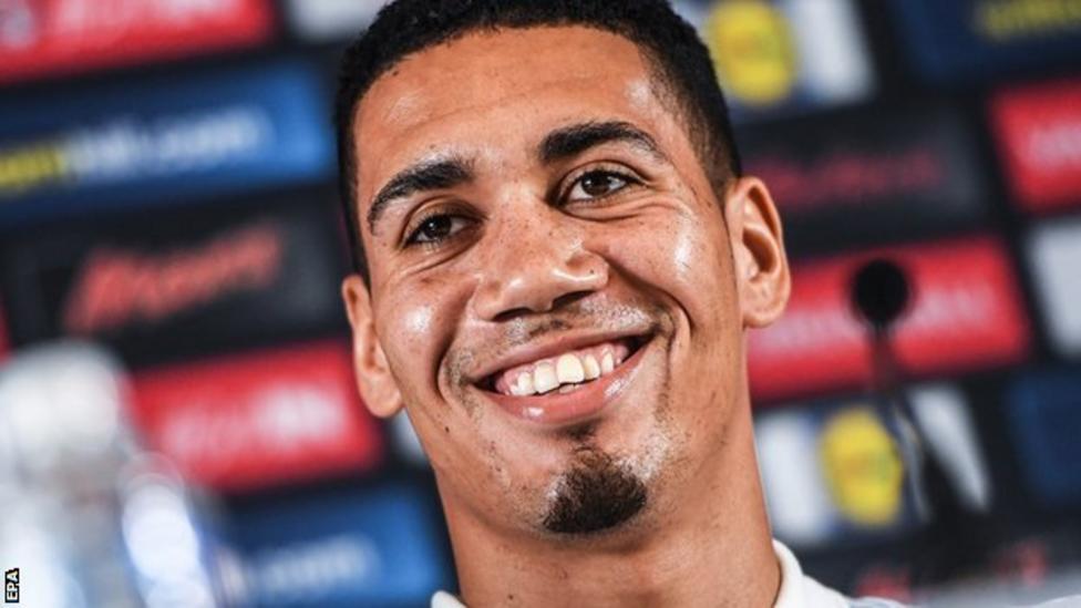 Euro 2016: England's Chris Smalling calms knee injury fears - BBC Sport