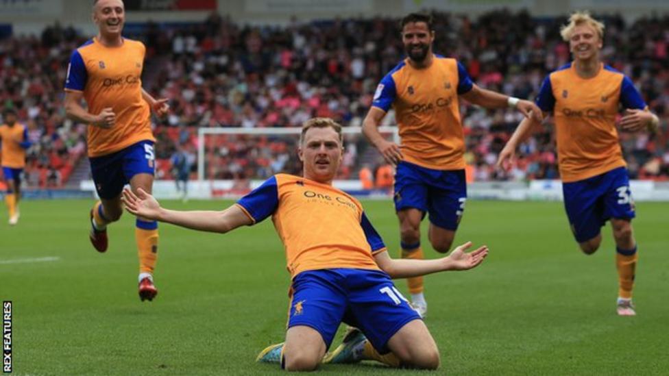 George Maris: Mansfield Town midfielder signs contract extension until ...