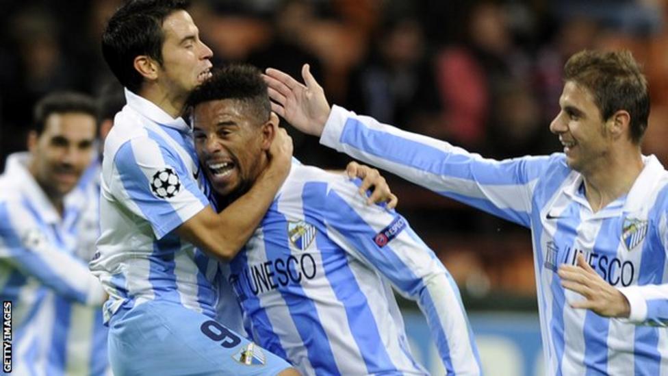 Champions League round-up: Malaga and Porto reach last 16 - BBC Sport