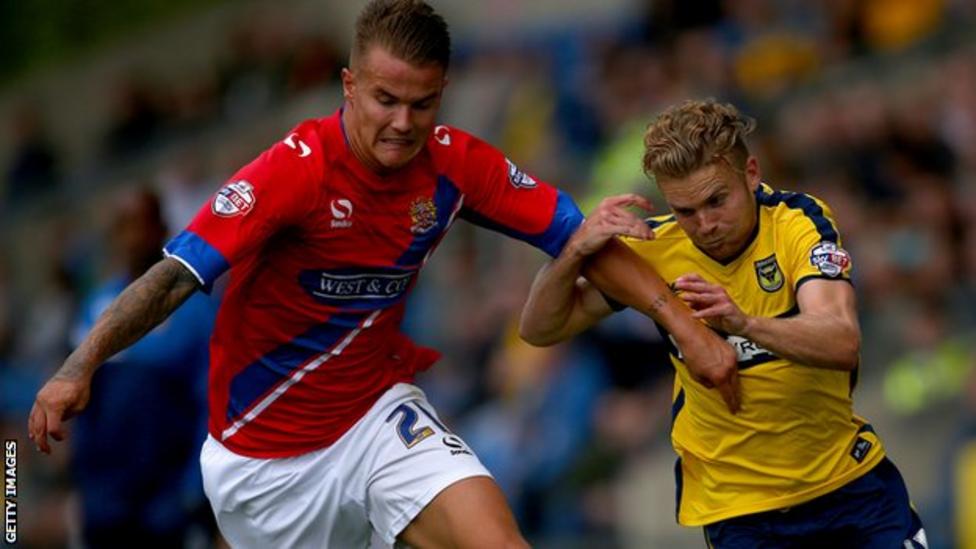 Matt Partridge: Defender departs Dagenham by mutual consent - BBC Sport